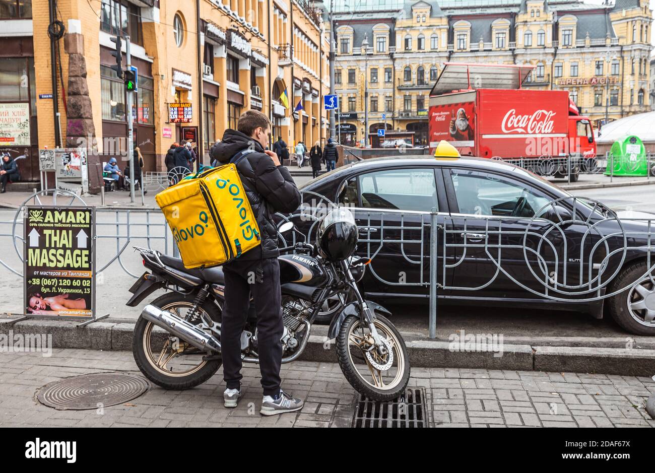 Kyiv, Ukraine - Nov. 16, 2019: A Glovo food delivery courier delivers ...