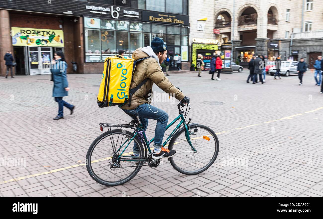 Kyiv, Ukraine - Nov. 16, 2019: A Glovo food delivery courier delivers ...
