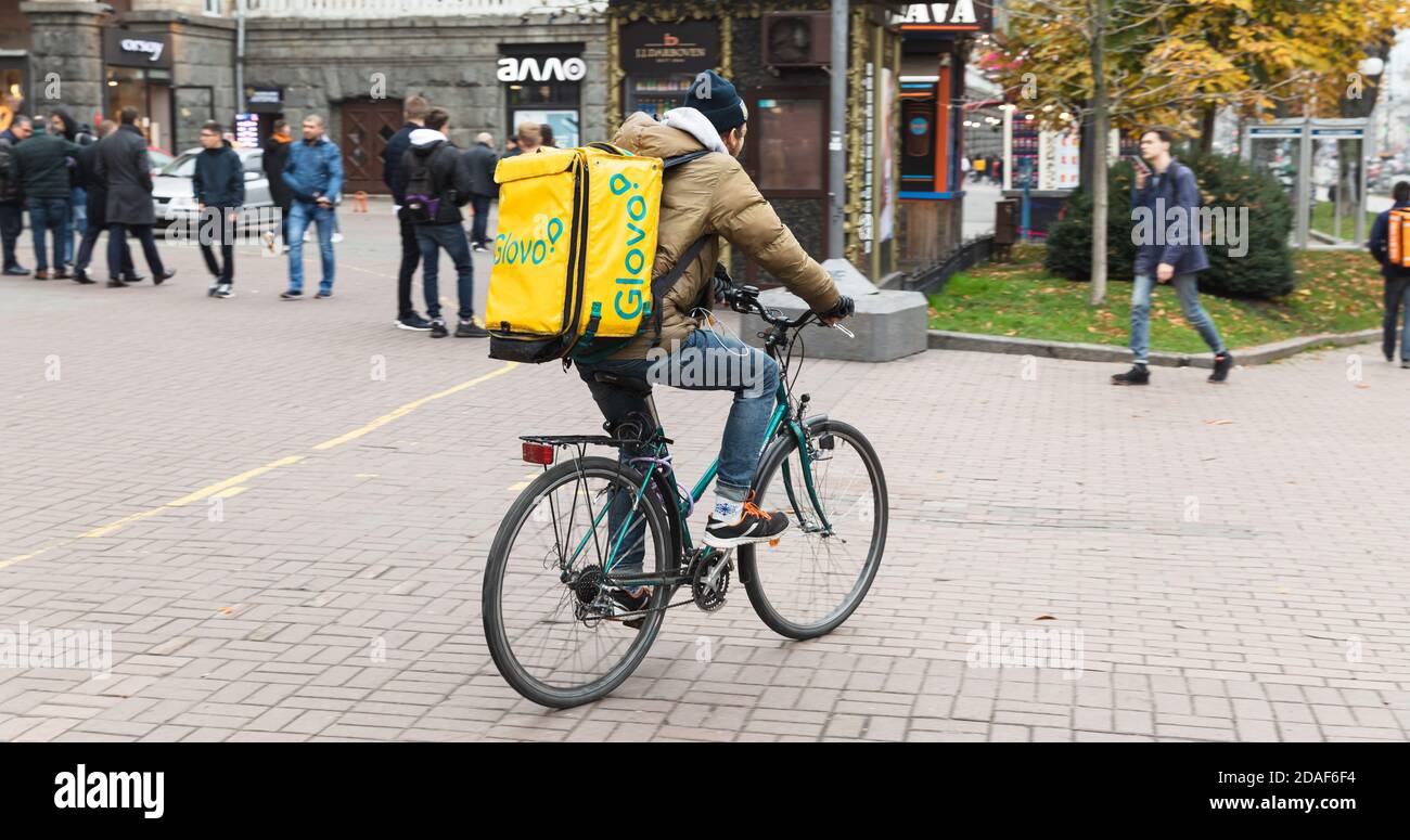 Kyiv, Ukraine - Nov. 16, 2019: A Glovo food delivery courier delivers ...
