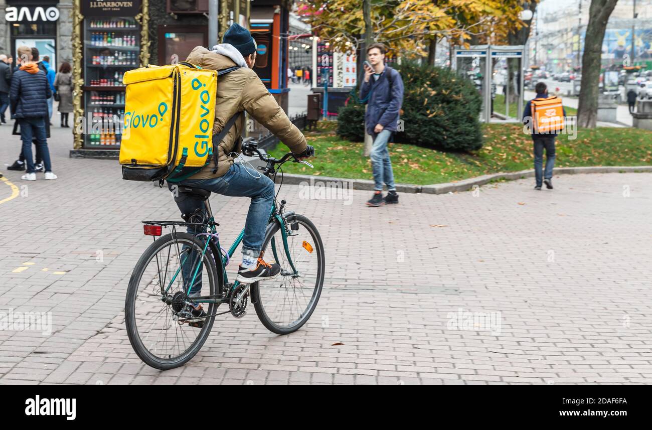 Kyiv, Ukraine - Nov. 16, 2019: A Glovo food delivery courier delivers ...