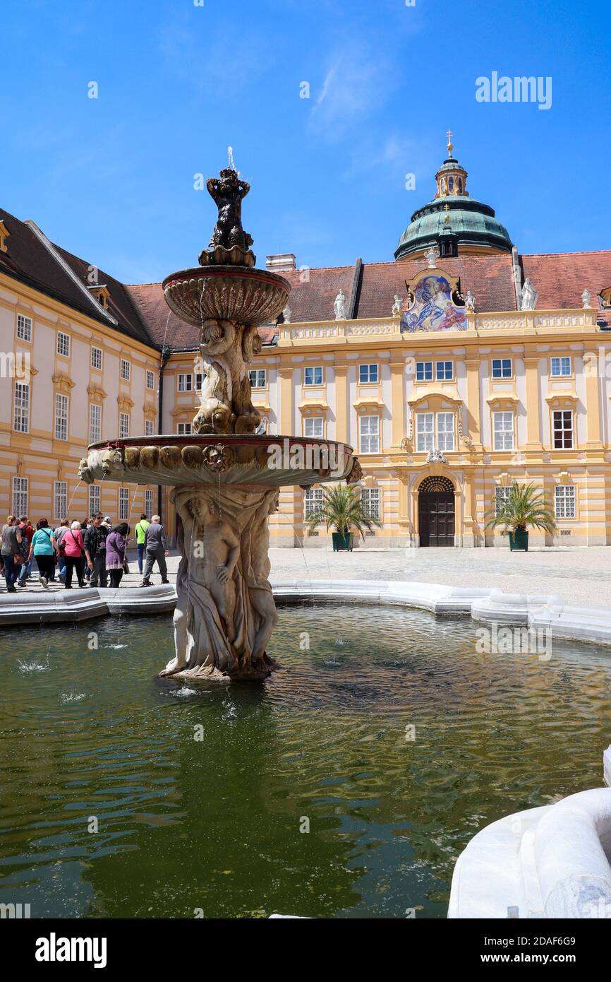 Fountain in courtyard of Melk Abbey on a summer day in Melk, Austria ...