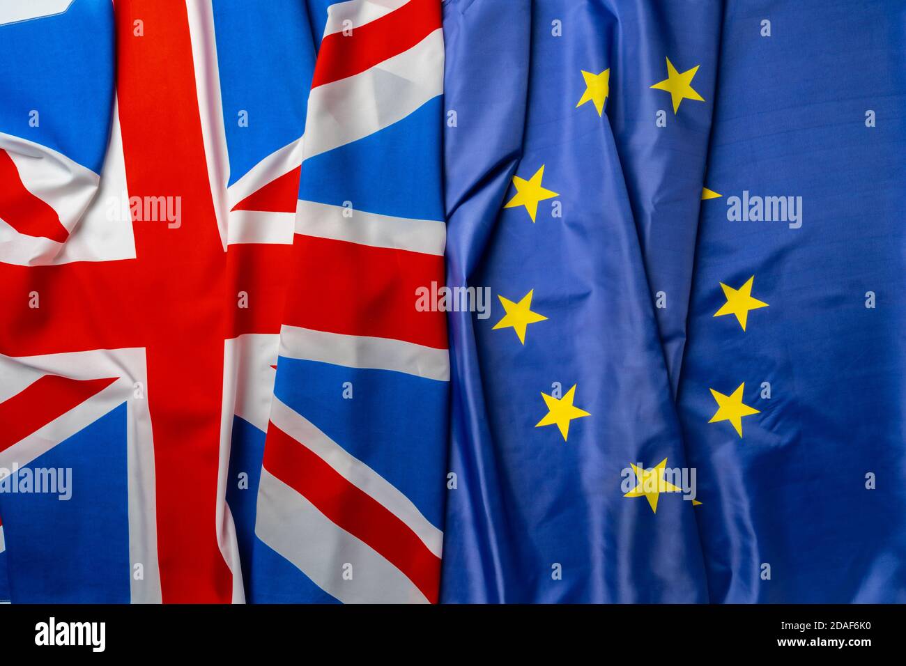 Flags of United Kingdom and European Union folded together Stock Photo ...