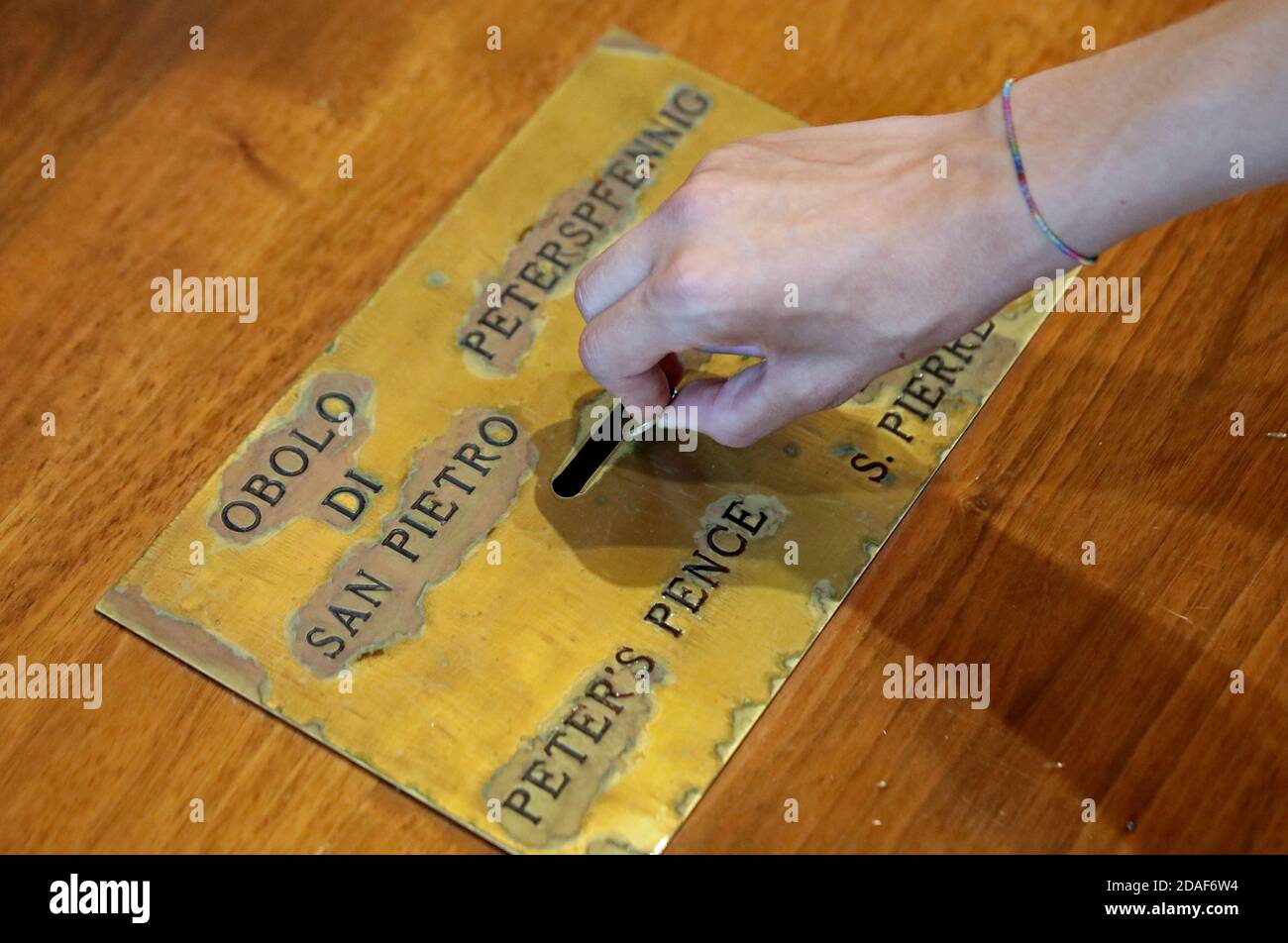 Money offering basket hi-res stock photography and images - Alamy