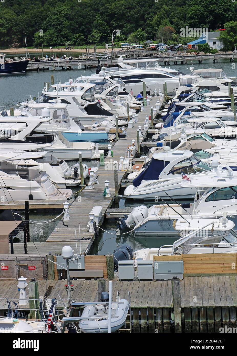 Small luxury boats in marina inside canal near New York Stock Photo - Alamy