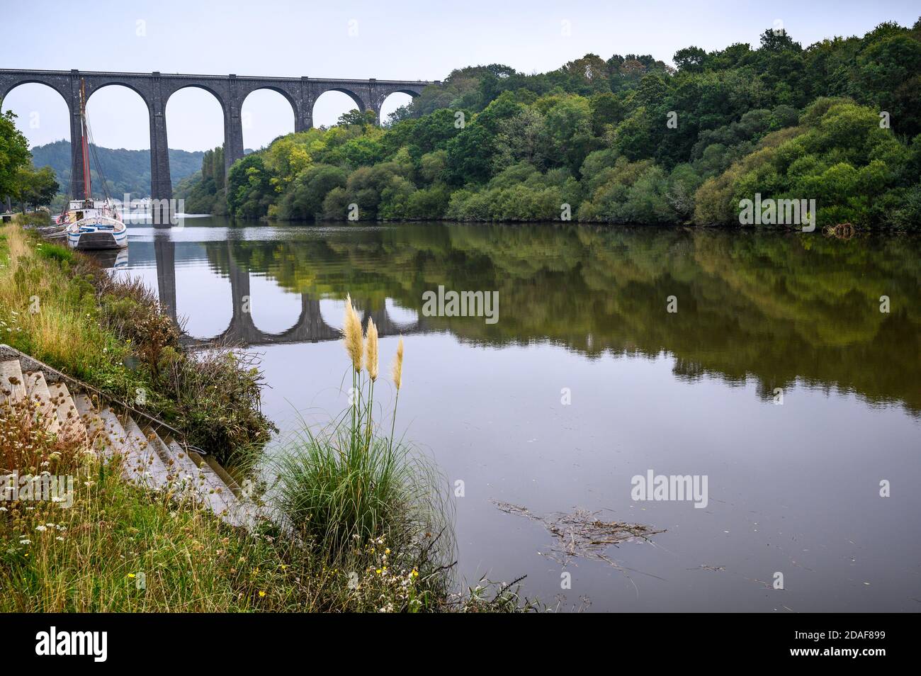landscape of old viaduct over the river Stock Photo - Alamy