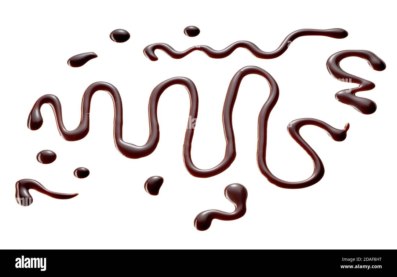 Drizzled homemade chocolate sauce in fancy shapes isolated on white ...