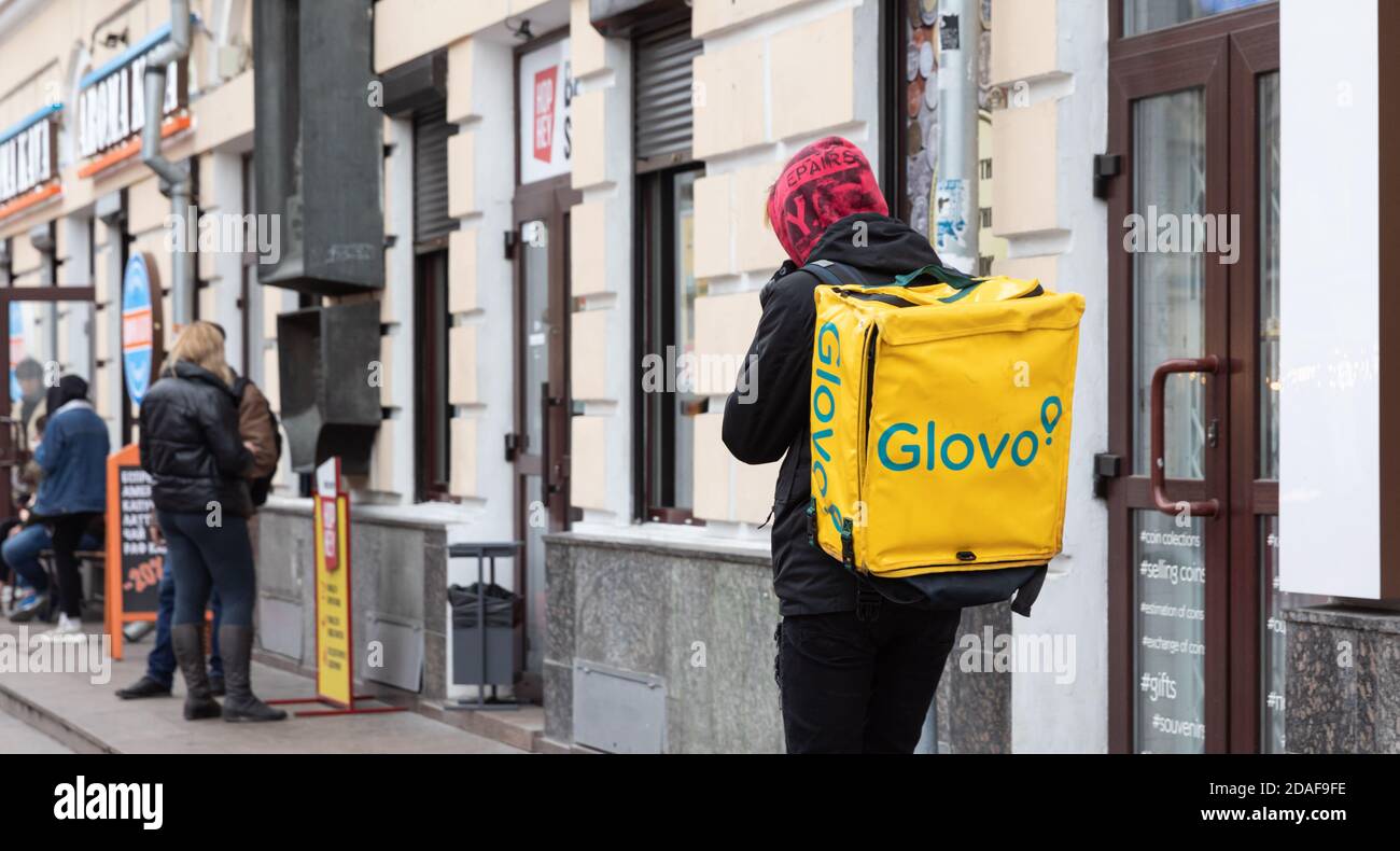 Kyiv, Ukraine - Nov. 16, 2019: A Glovo food delivery courier delivers ...