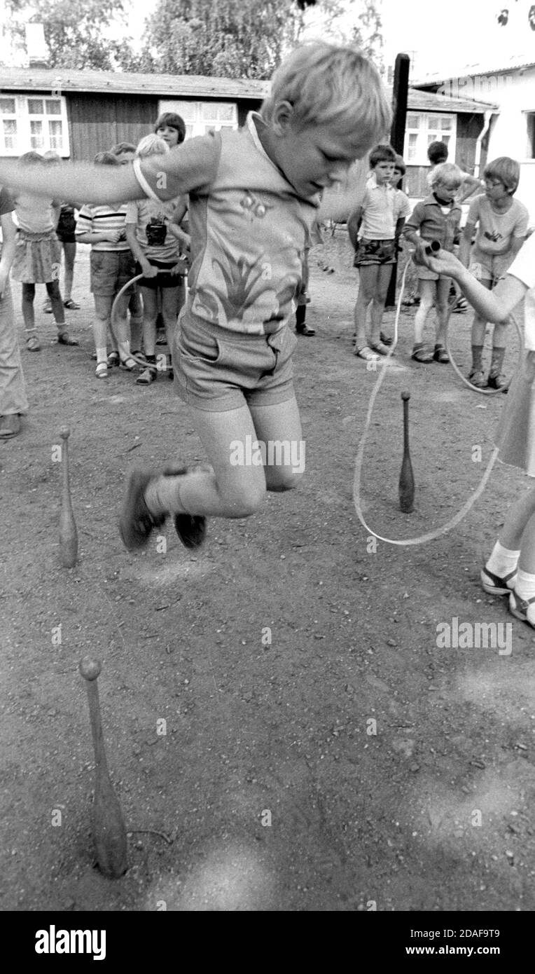 30 November 1983, Saxony, Eilenburg: Children play in the summer of ...