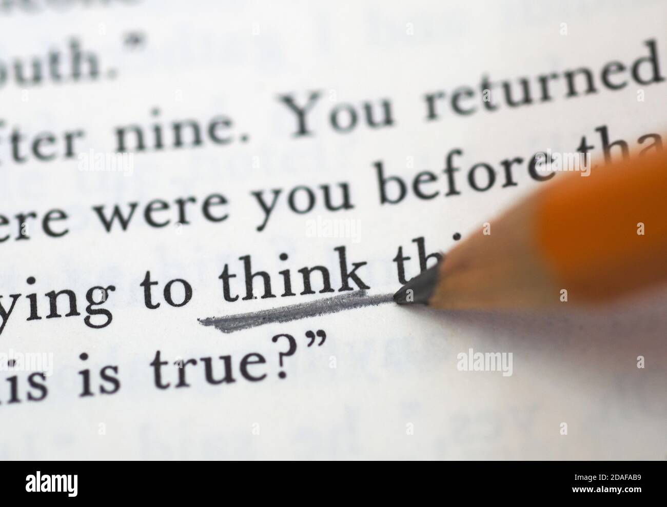 word "think" underlined with pencil in a book page Stock Photo - Alamy