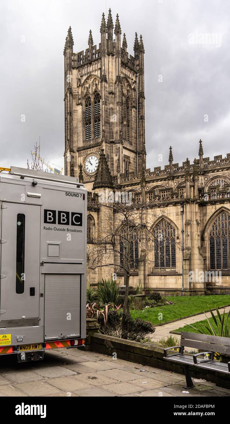A B.B.C radio van stands outside Manchester Cathedral Stock Photo - Alamy
