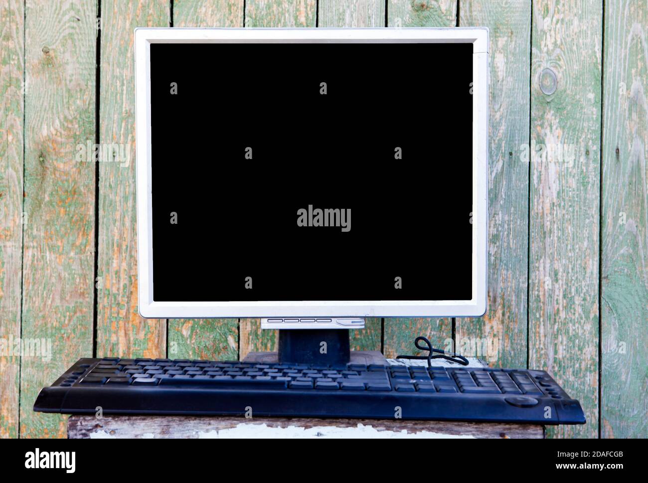 Old and Dirty Computer Monitor on the Weathered Paint Wall Background ...