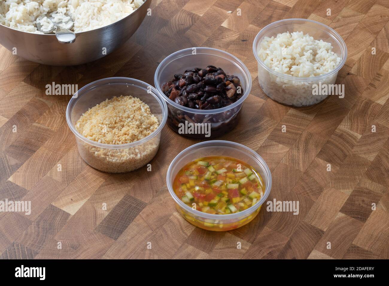 Food take away Brazilian traditional Rice and Black beans, vinagrette ...
