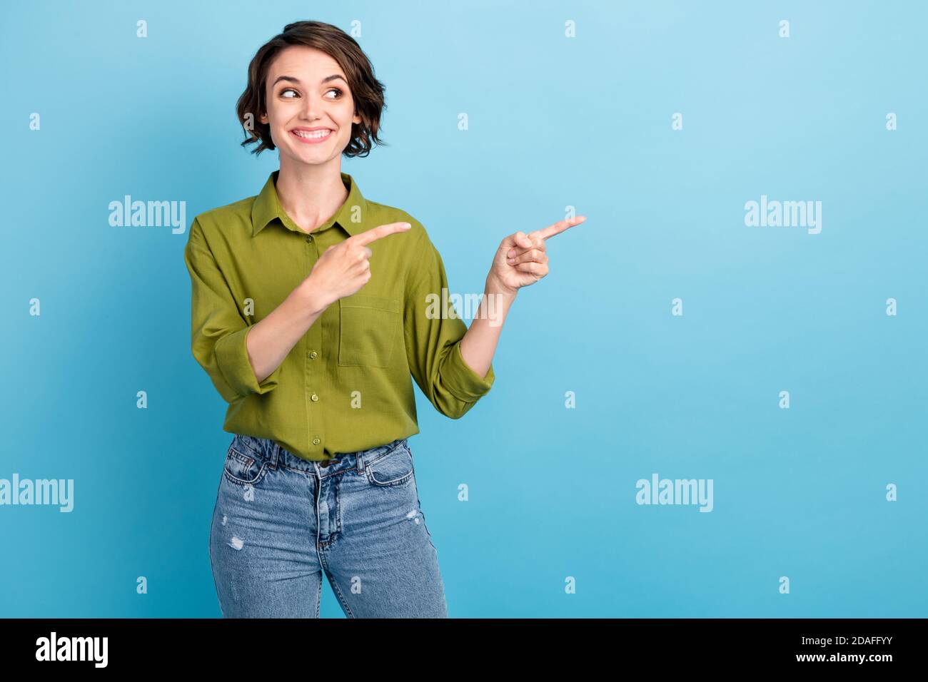 Photo of pretty lady short hairdo sly cunning look directing forefinger ...