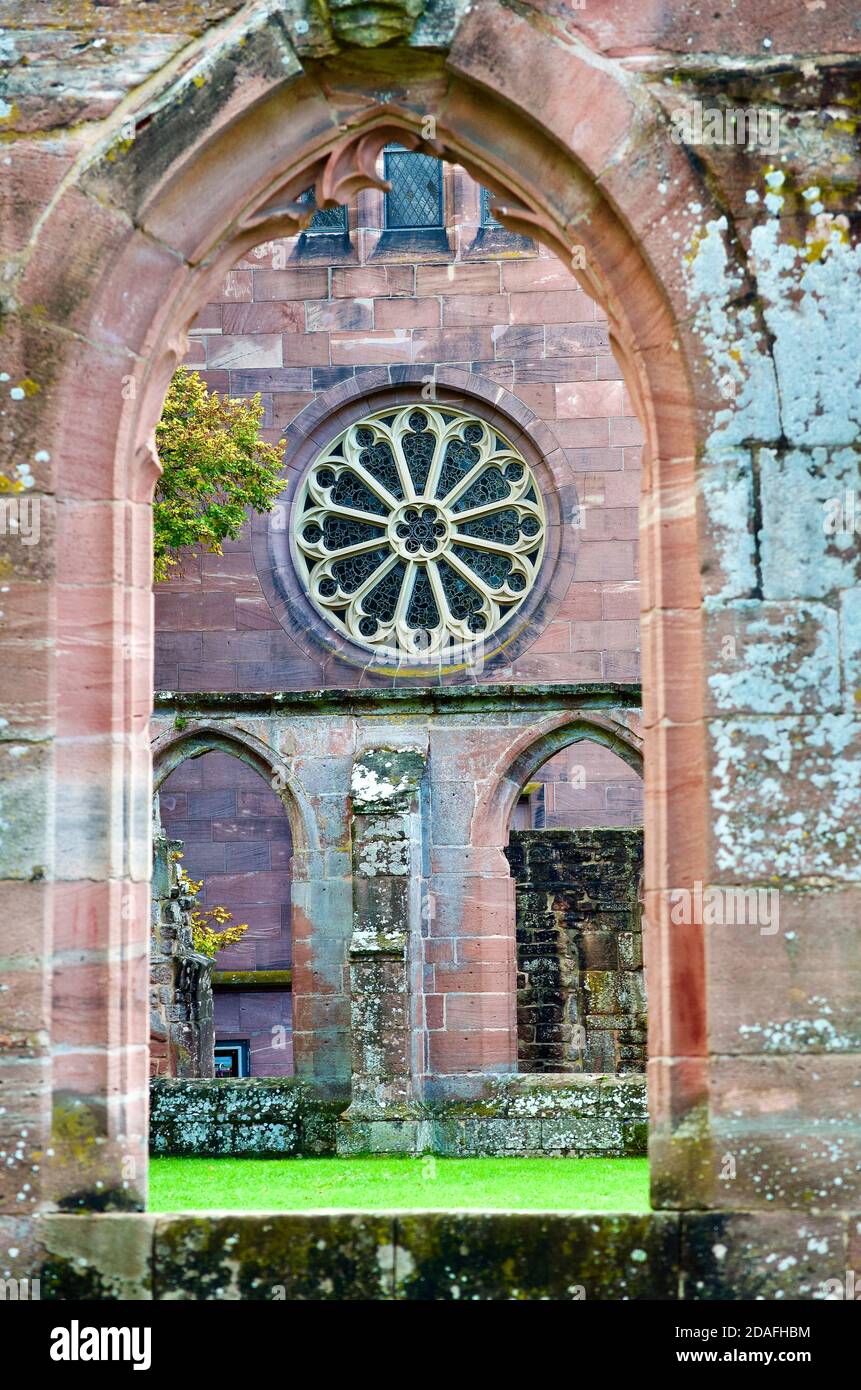 round monastery window with red stone wall hirsau monastery Stock Photo ...