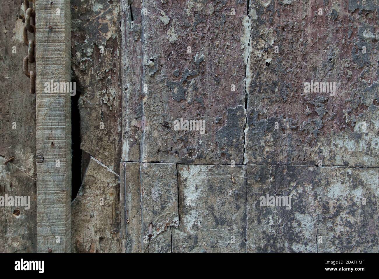 Ancient weathered wooden door close-up. Rotten wood texture Stock Photo ...