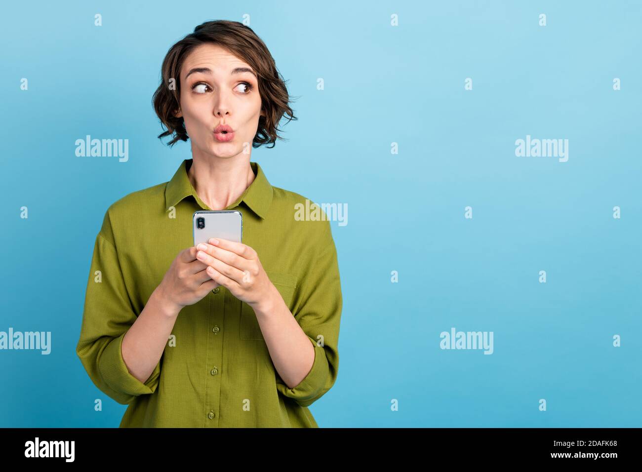 Photo Of Lovely Pretty Lady Short Hairstyle Hands Hold Telephone Excited Look Empty Space Funny