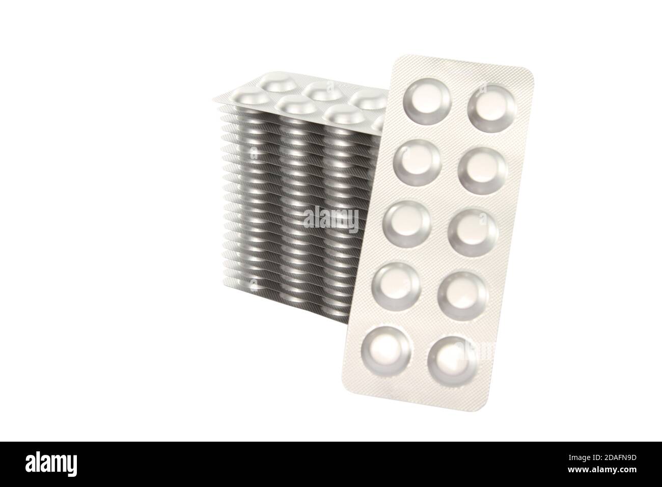 Closeup high angle shot of pills on a white surface Stock Photo - Alamy