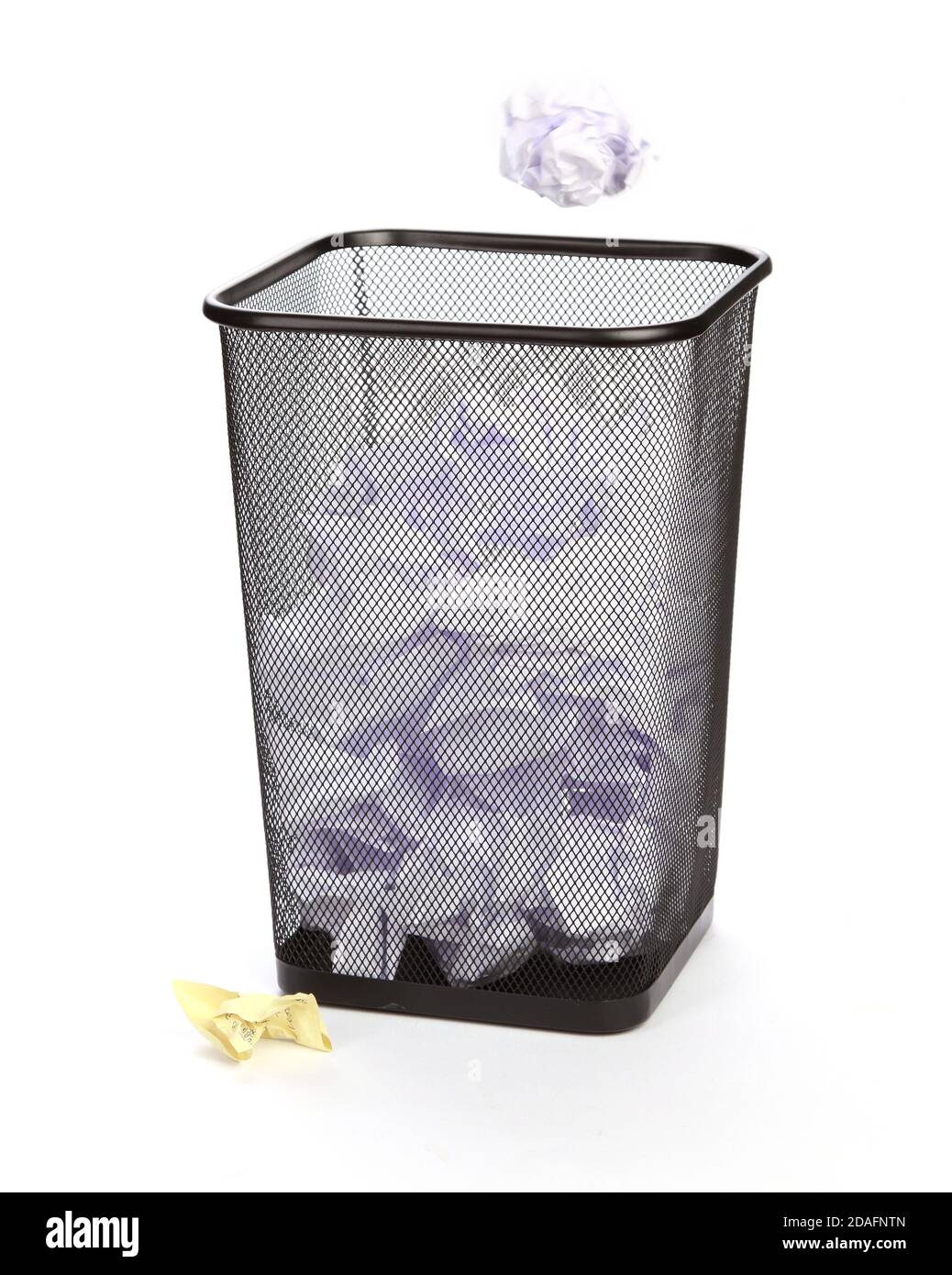 Vertical shot of a trash bin with crumpled sheet of paper Stock Photo ...