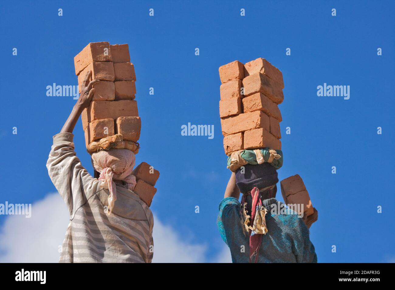 Carrying bricks on the head, Antananarivo, Madagascar Stock Photo - Alamy