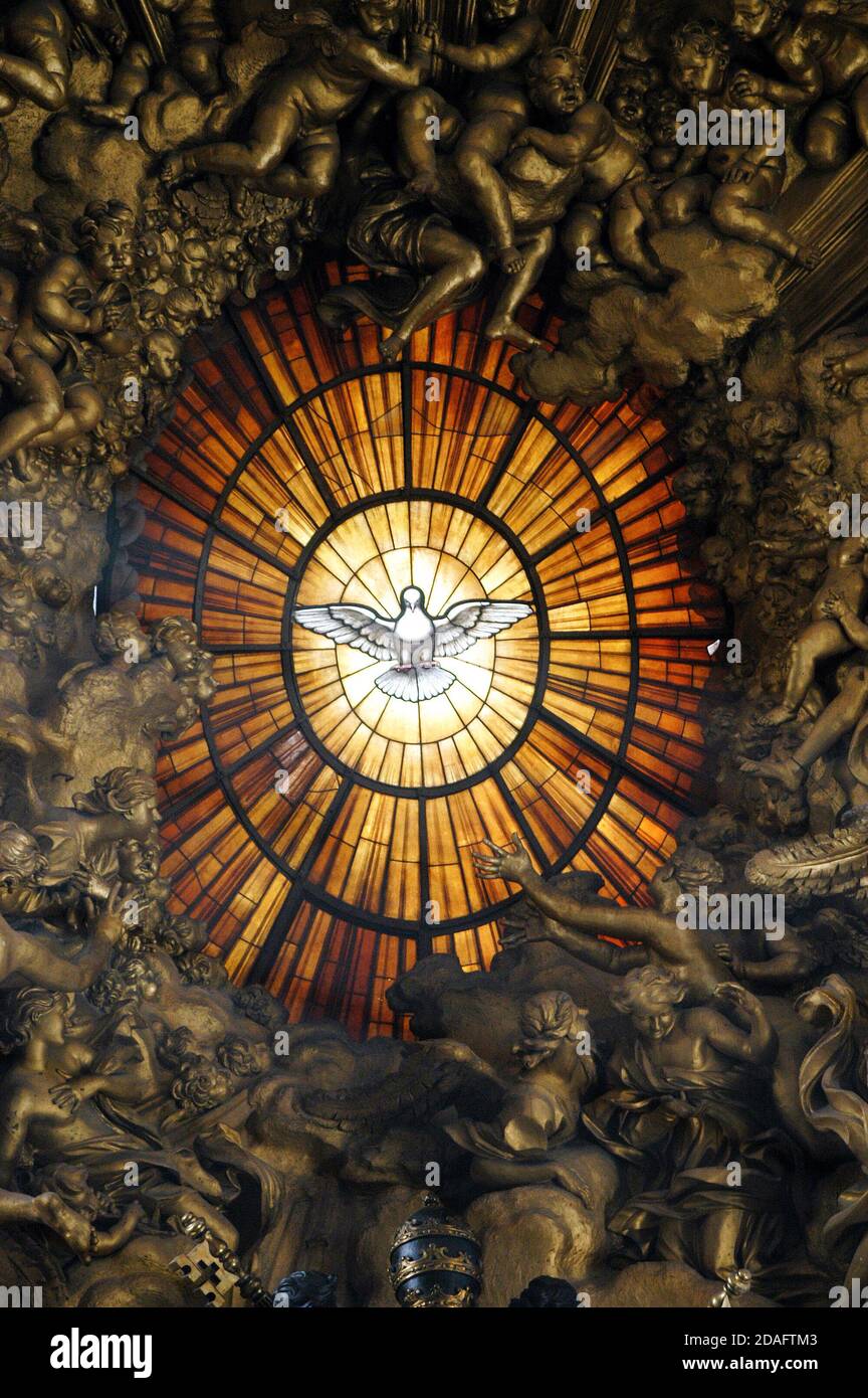 artistic stained glass window of the Holy Spirit depicted with a dove ...