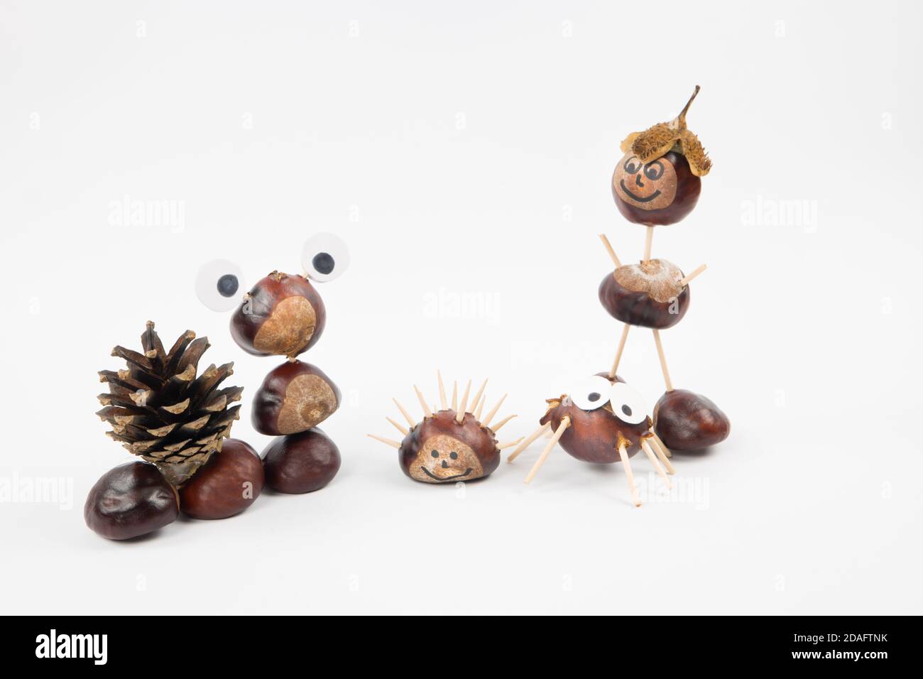 Creative pine cone and chestnut figures hi-res stock photography and ...