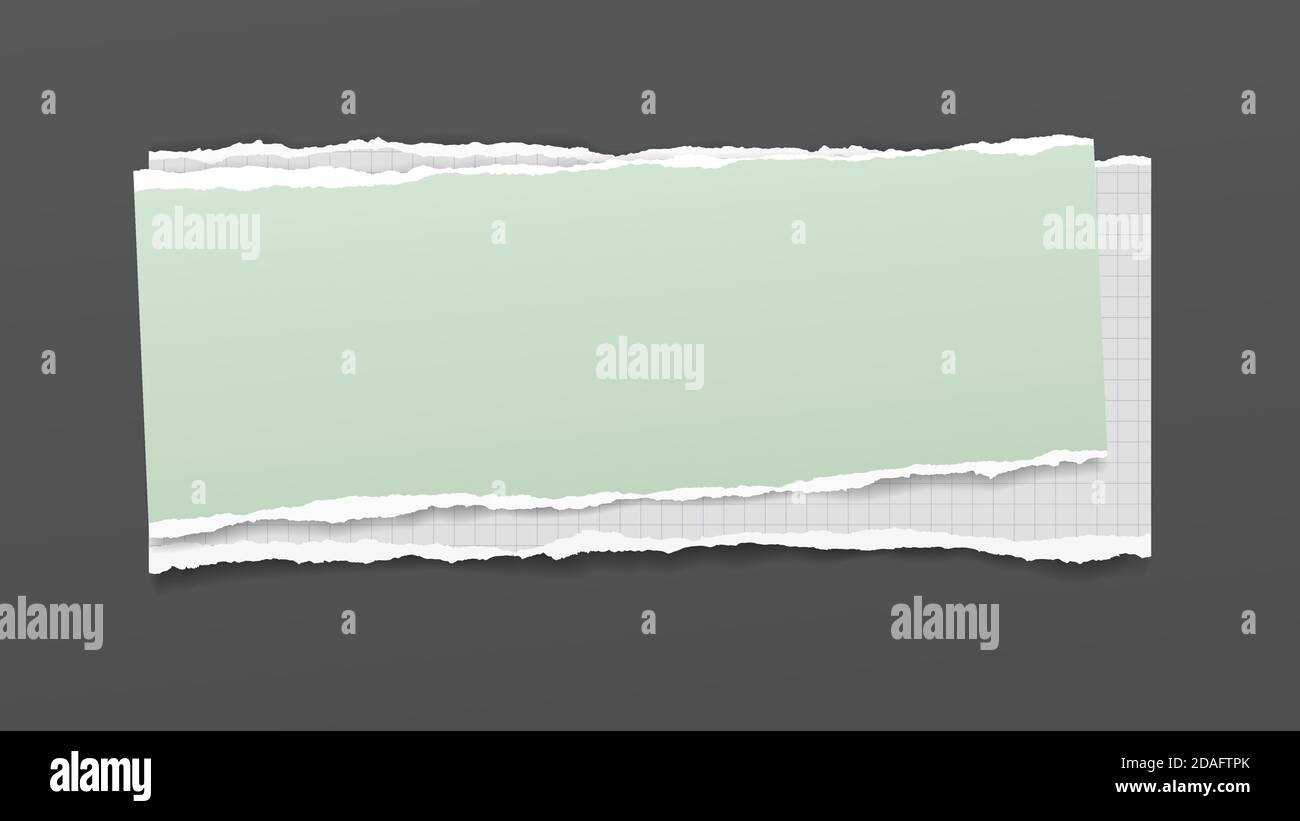 Torn of white math and green note, notebook paper are on dark grey ...