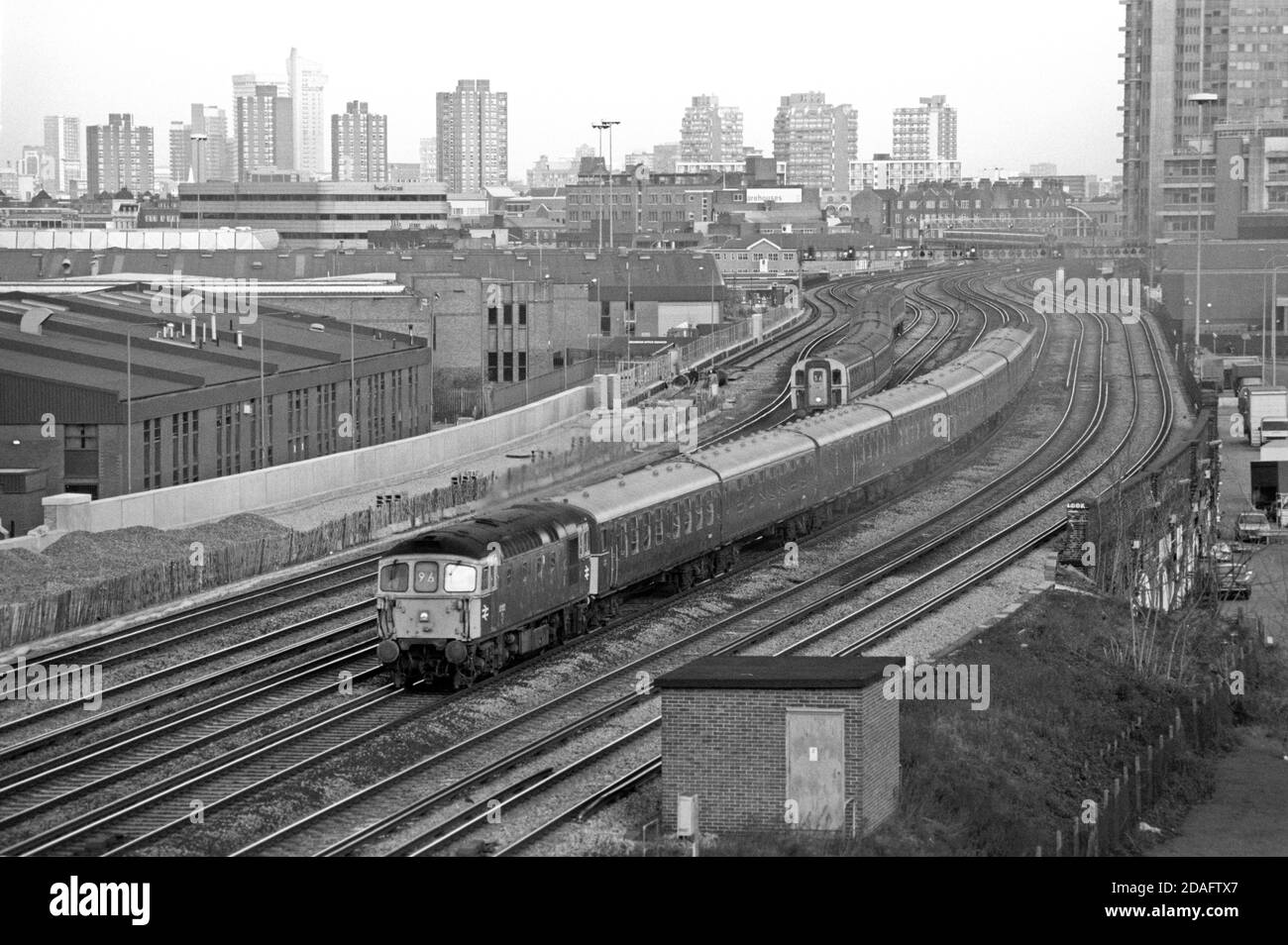 A Class 33 diesel locomotive number 33102 and refurbished 4TC units ...