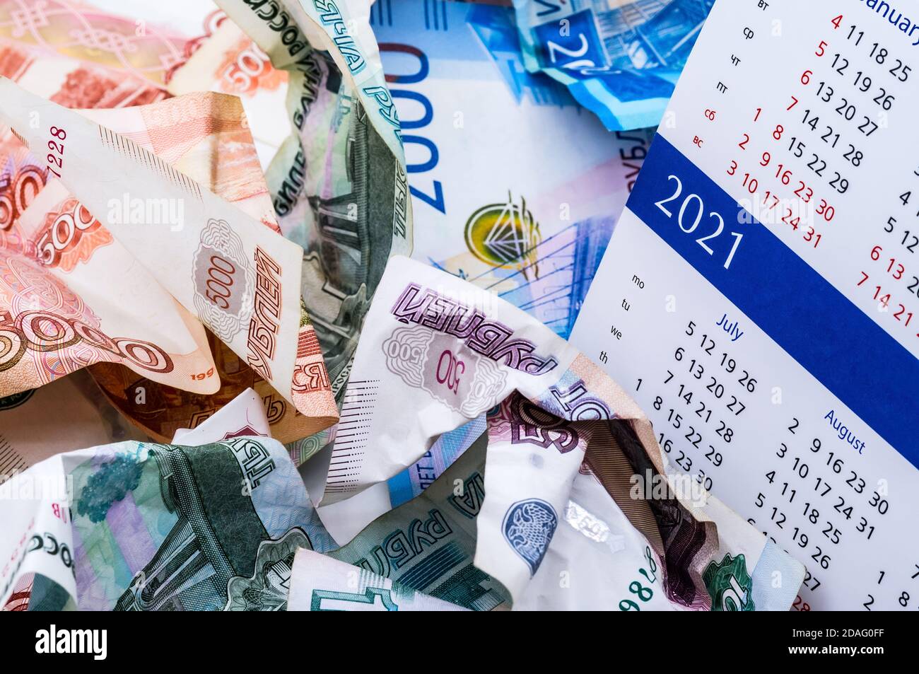 crumpled paper money, Russian money and calendar Stock Photo - Alamy
