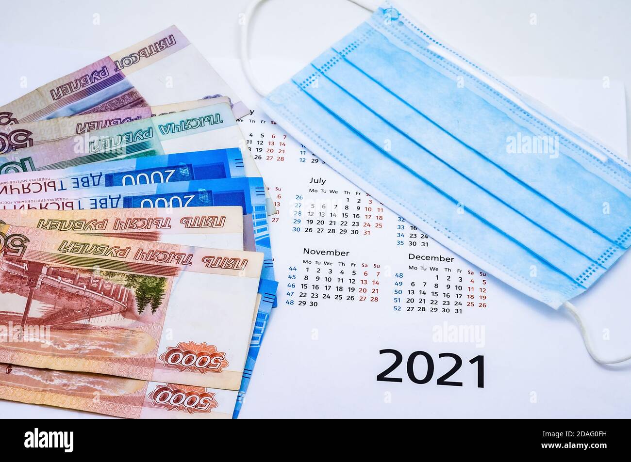 fabric mask and Russian money, medical mask and calendar 2021, mask on ...