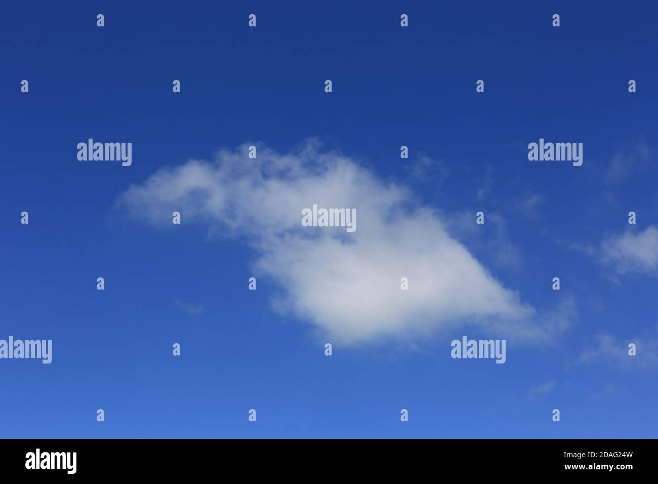 Alone white cloud in blue sky Stock Photo - Alamy