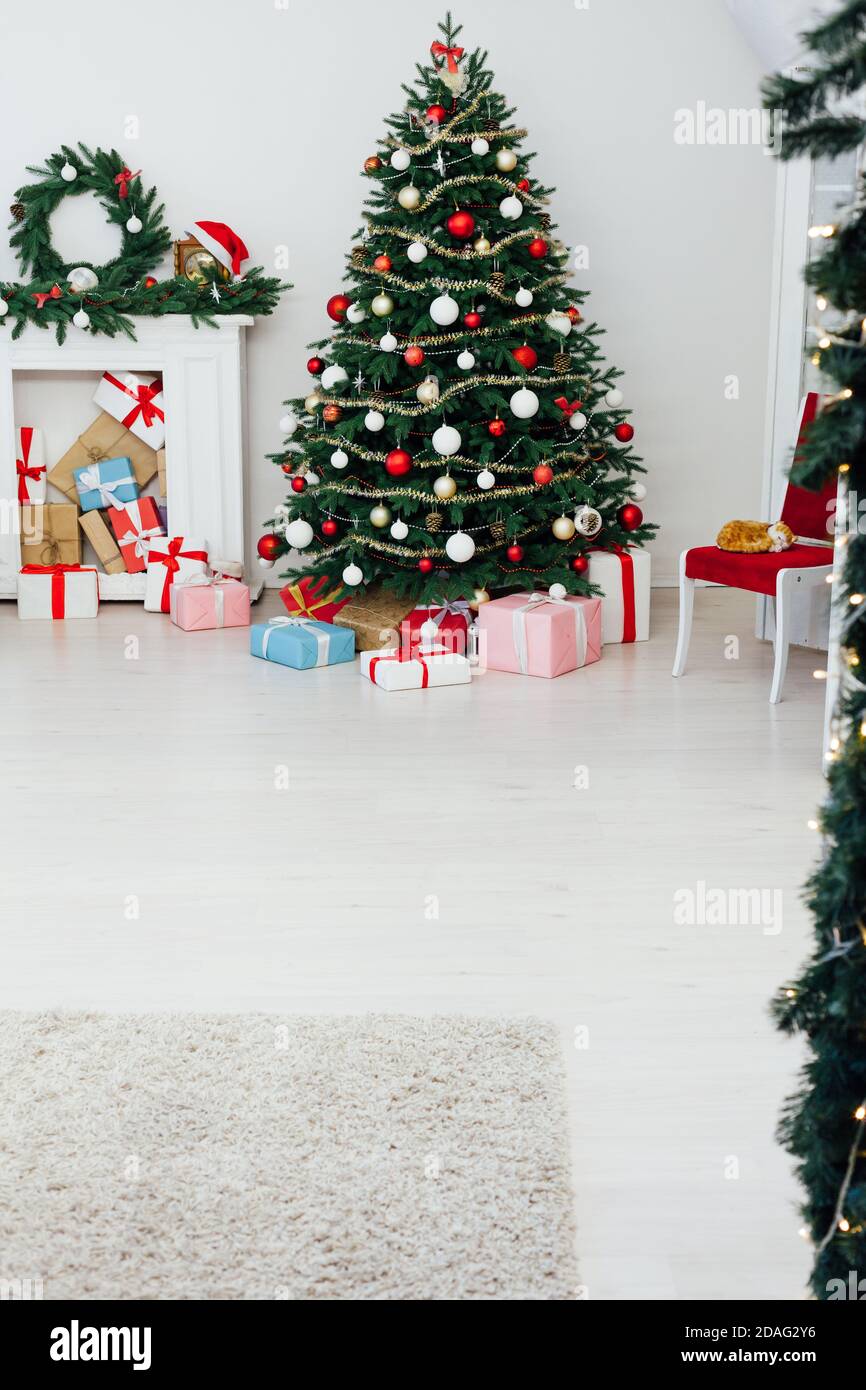 New Year's Eve Christmas Tree With Gifts Stock Photo - Alamy