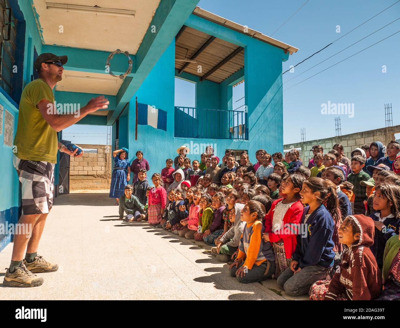 A juggler performs for school kids Stock Photo - Alamy