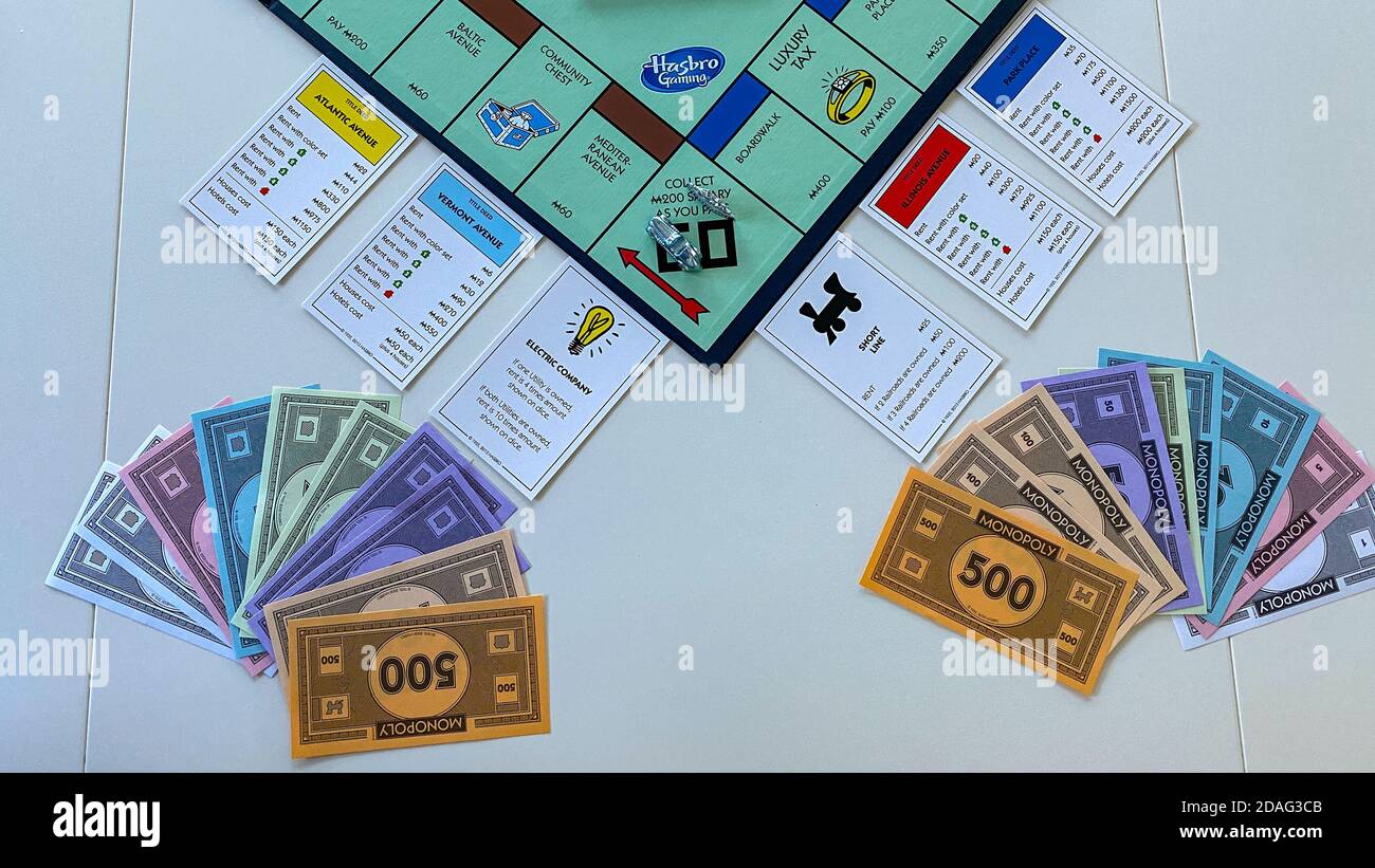 Orlando, FL/USA-12/20/19: Pieces for the game Monopoly by Hasbro on a ...