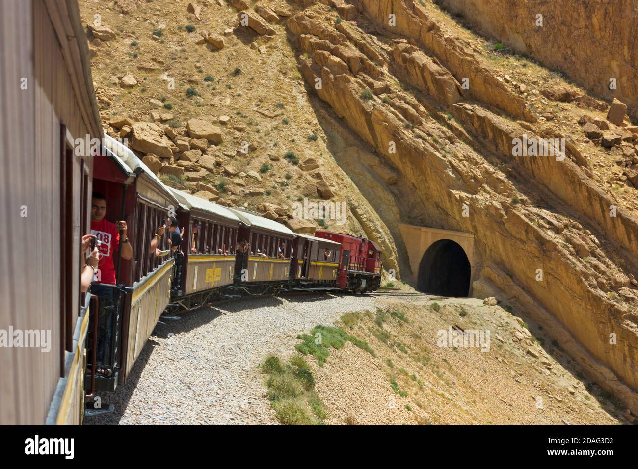 Train going through Selja Gorges in the Sahara Atlas Mountain Range ...