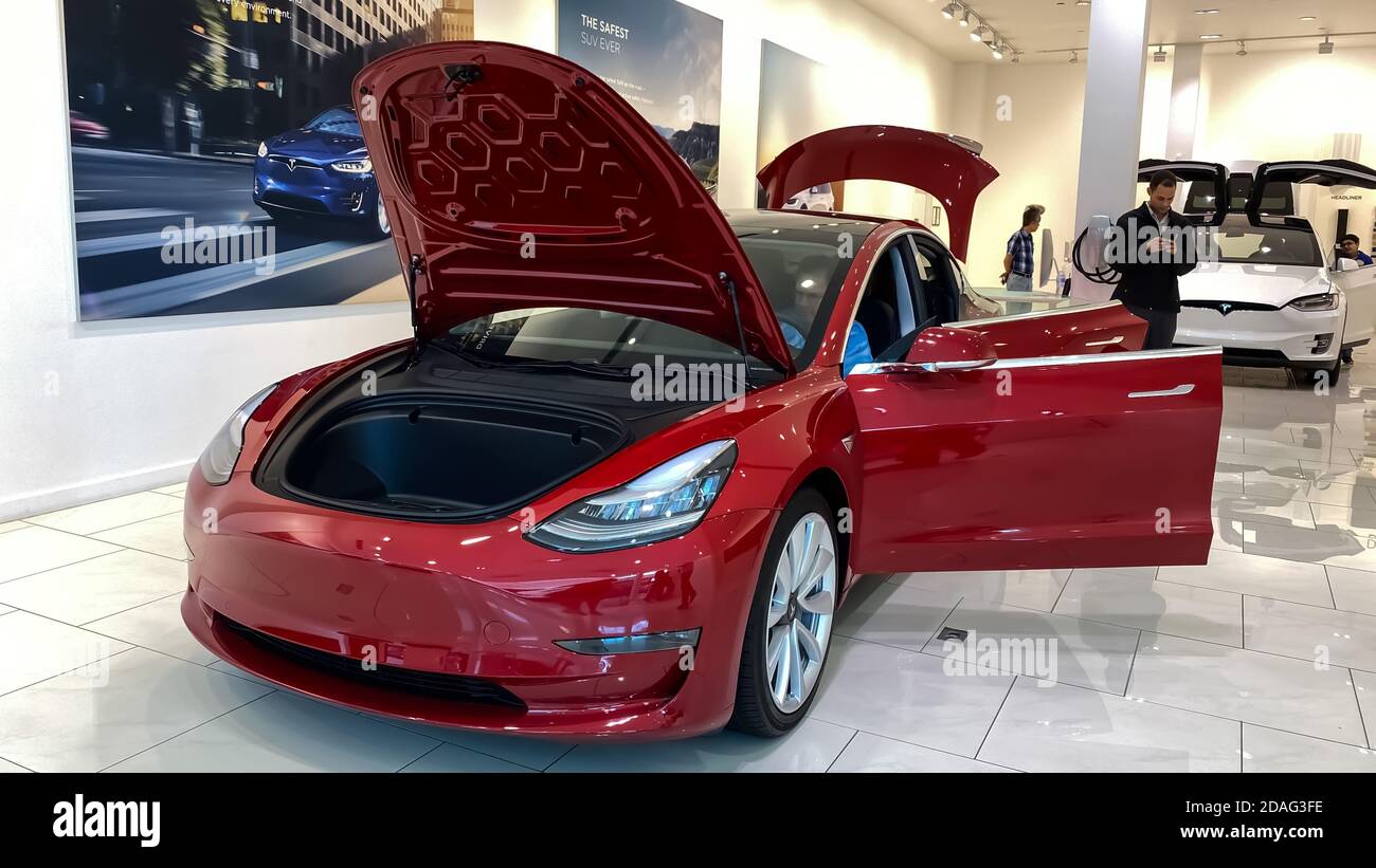 Orlando, FL/USA-2/17/20: A Tesla Model 3 at a Tesla retail store. Tesla ...