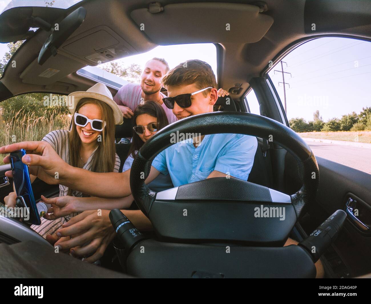 group of friends in car Stock Photo - Alamy