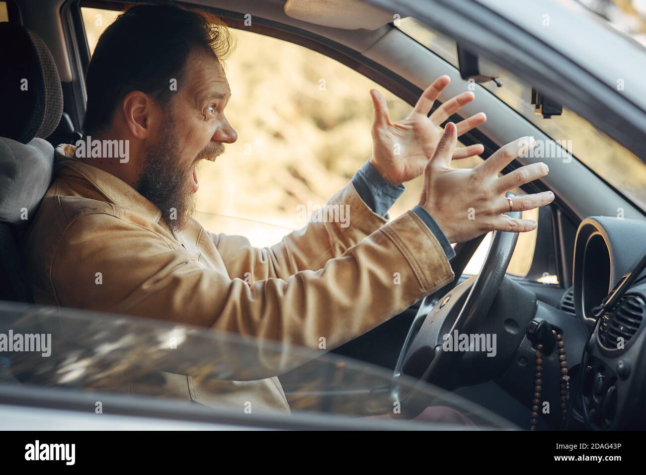 Crazy Angry Man Annoyed While Driving a Car. Mad Agrressive Driver ...