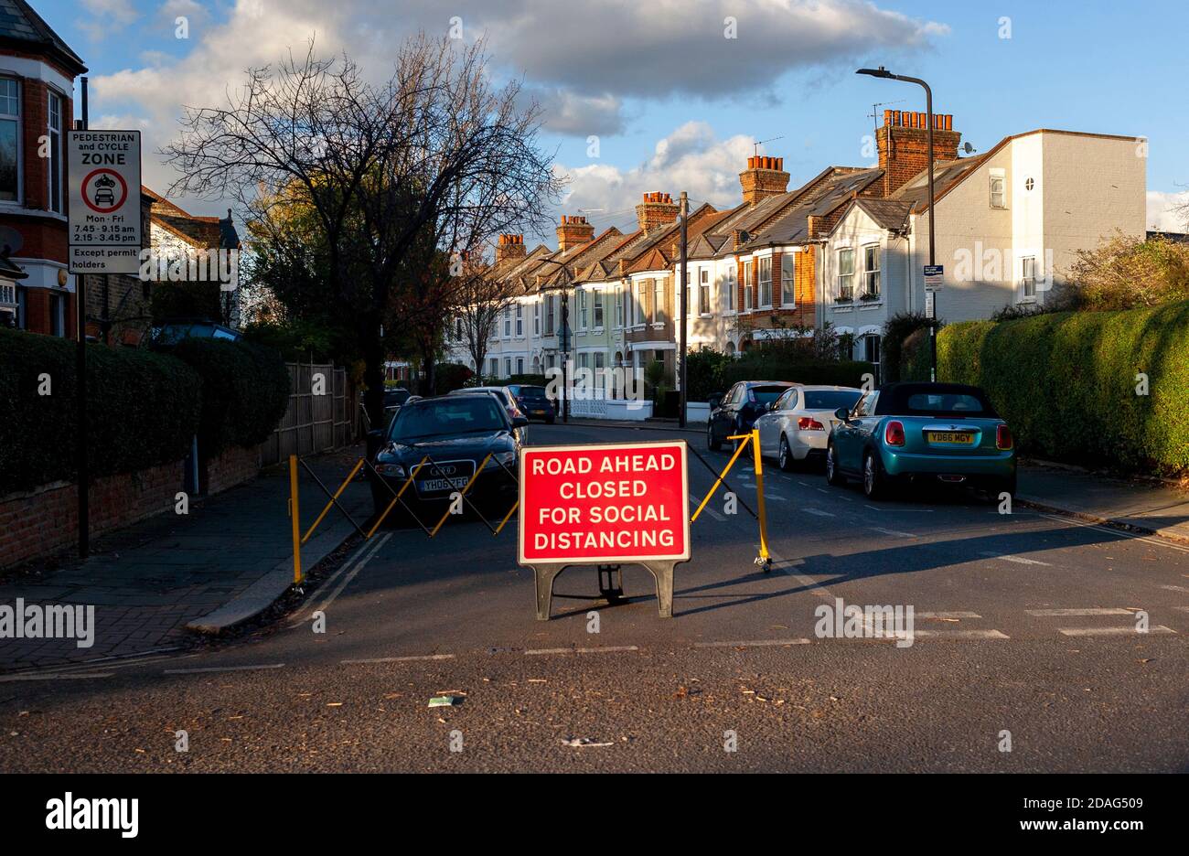 ‘Road ahead closed for social distancing’ traffic sign in a residential ...