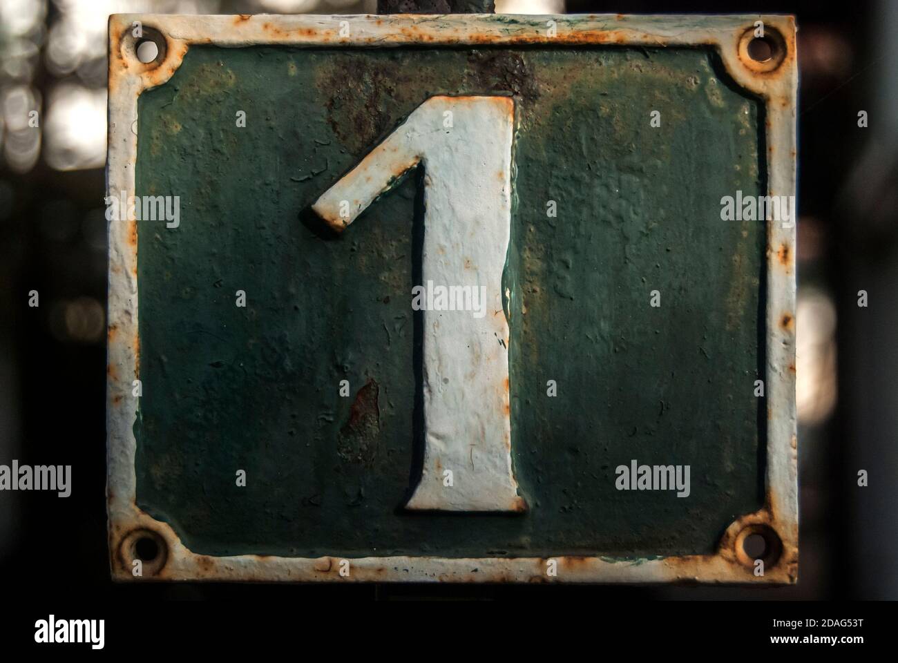 Old retro weathered cast iron plate with number 1 closeup Stock Photo ...