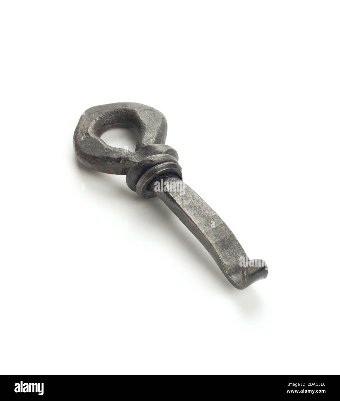 Large stone key on a white surface Stock Photo - Alamy