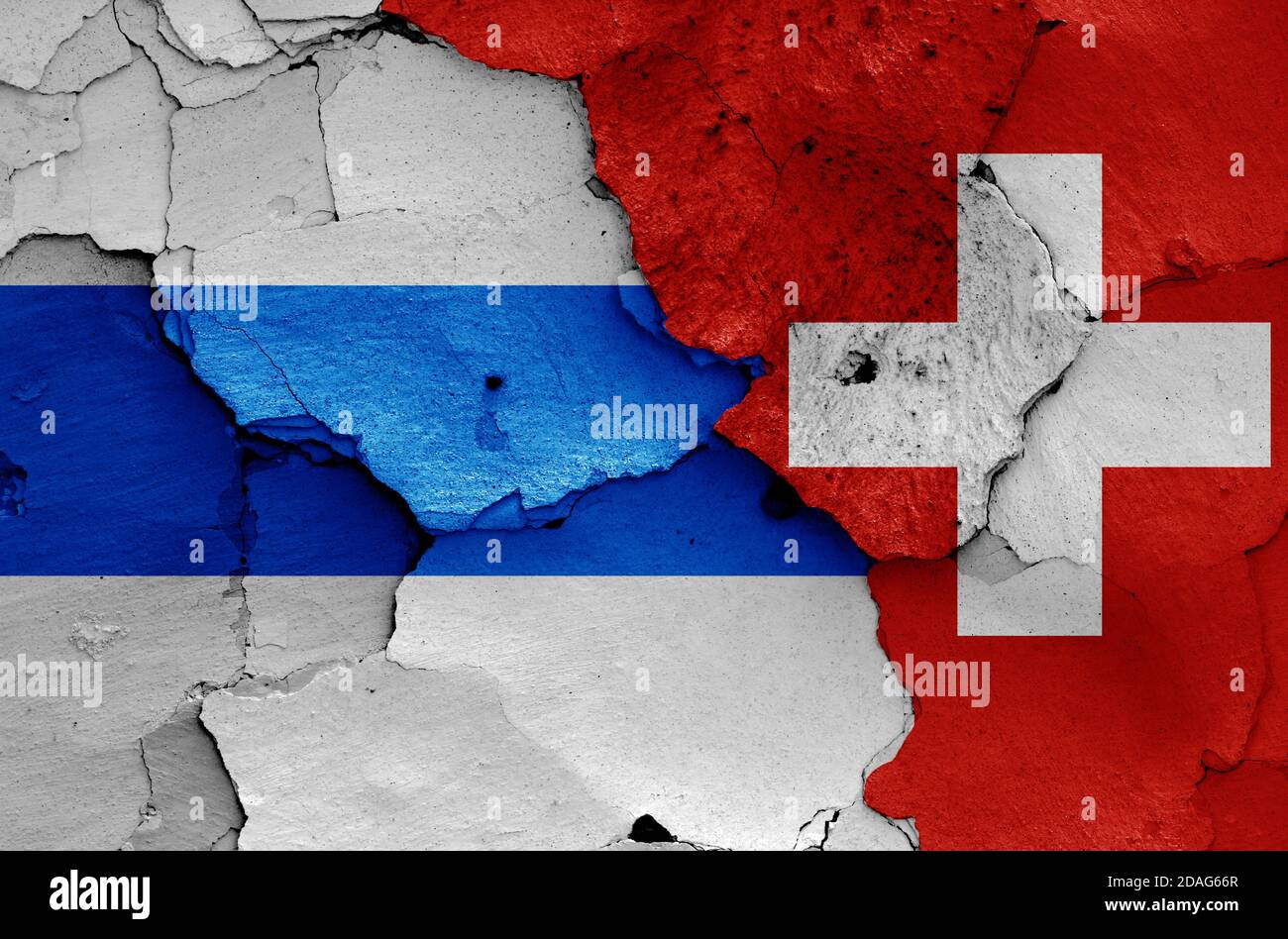 flags of Zug canton and Switzerland painted on cracked wall Stock Photo ...