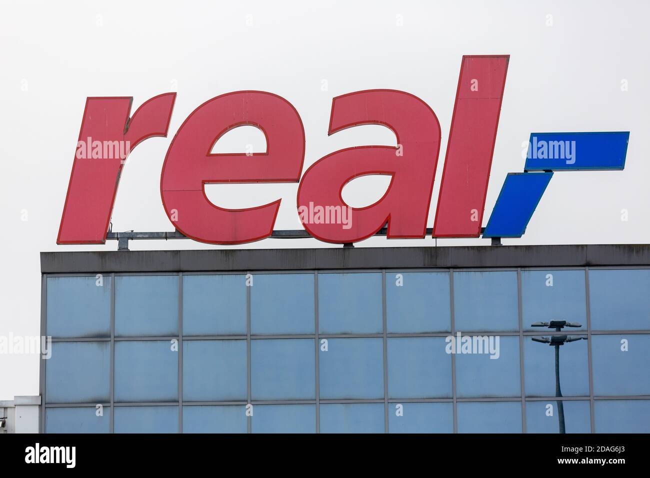 PASSAU / GERMANY - NOVEMBER 8, 2020: Branch logo of real hypermarket ...
