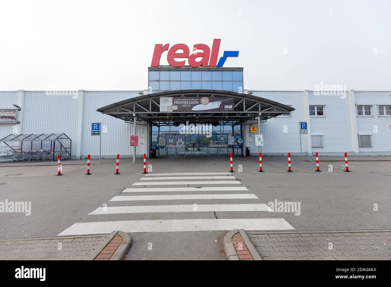 PASSAU / GERMANY - NOVEMBER 8, 2020: Branch logo of real hypermarket ...