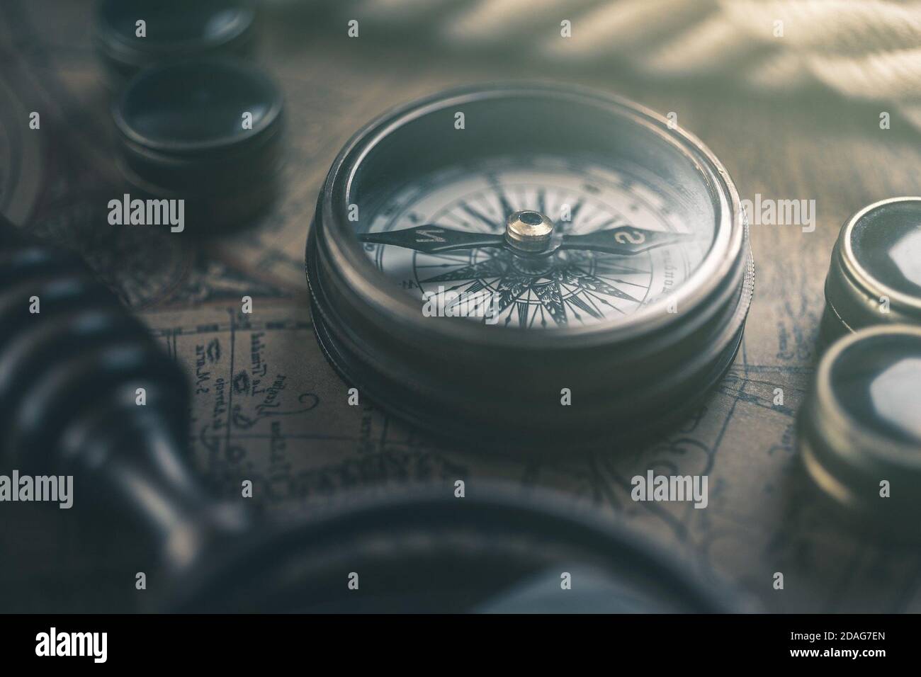 an instrument containing a magnetized pointer which shows the direction ...