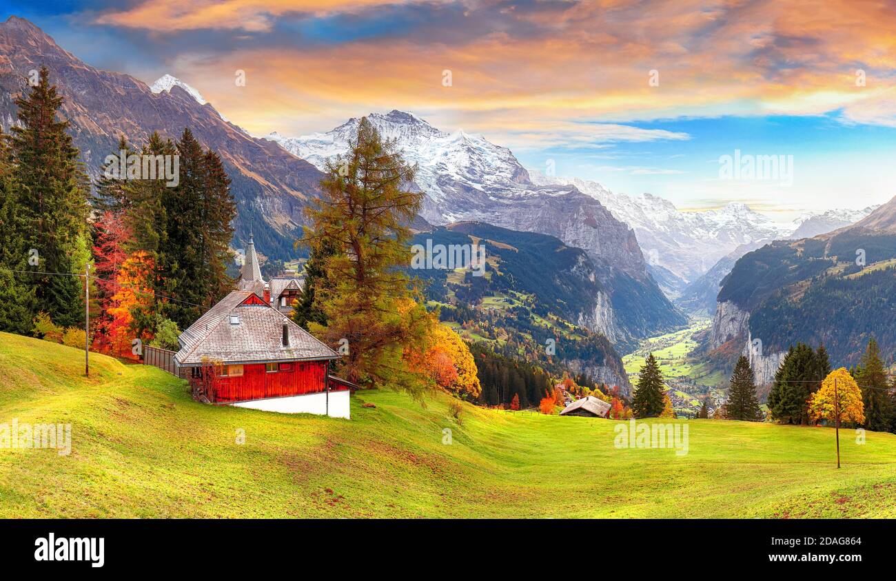 Scenic autumn view of picturesque alpine Wengen village and ...