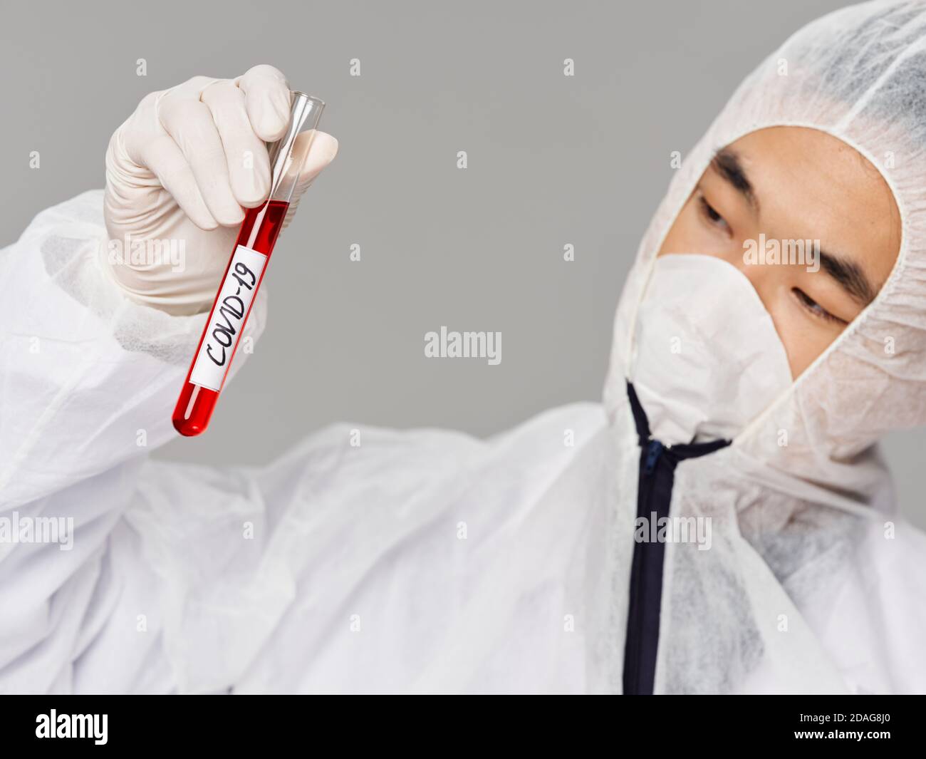 Male laboratory assistant analyzes hi-res stock photography and images ...