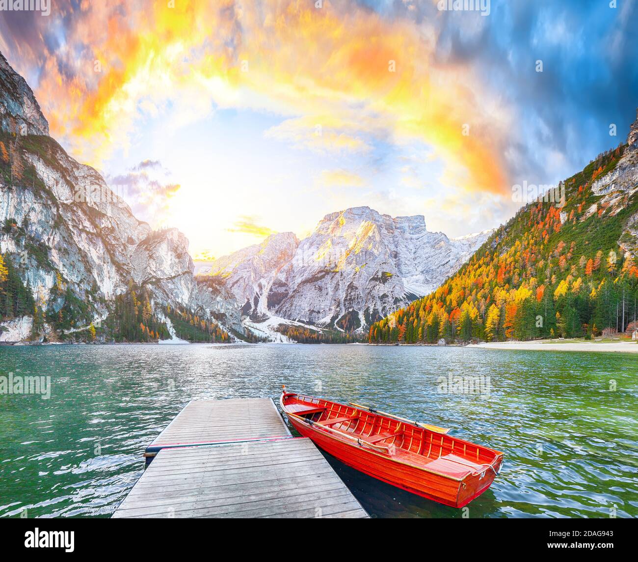 Marvelous scenery of famous alpine lake Braies at autumn during sunrise ...
