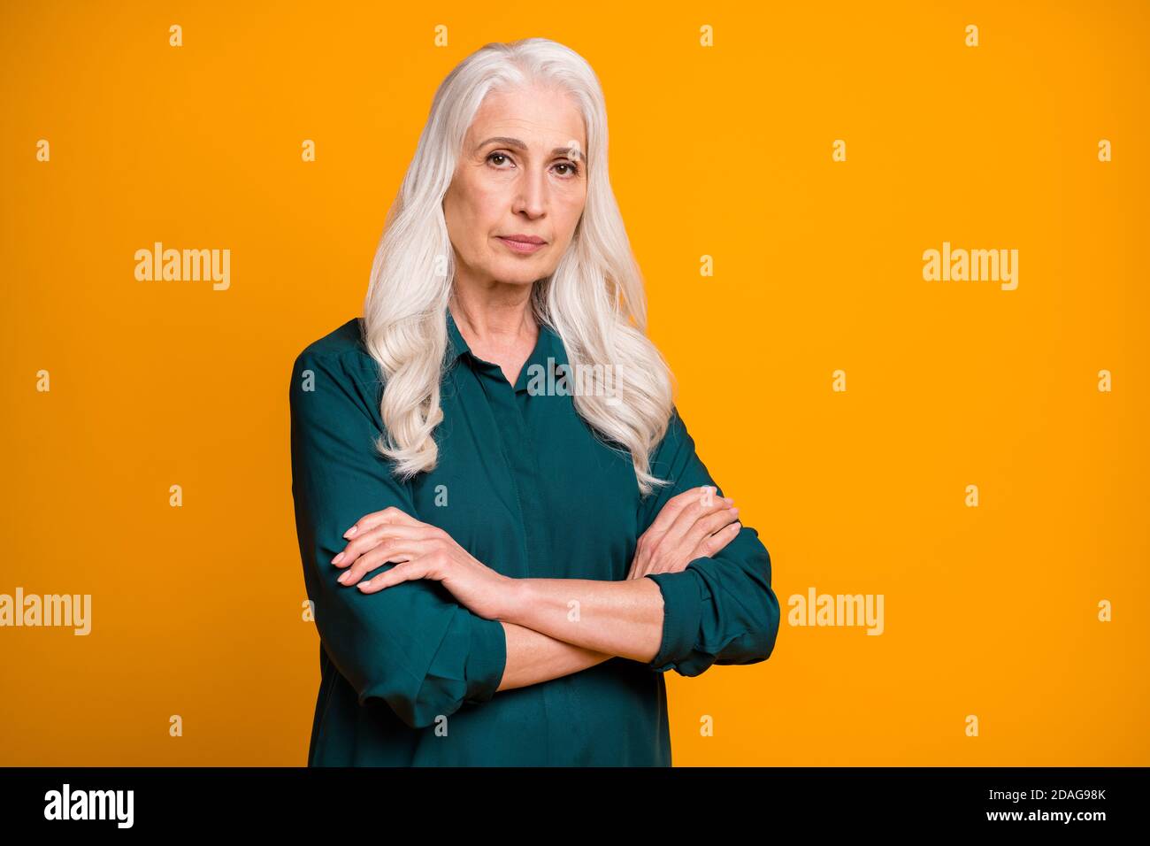 Photo of self-confident white haired bossy grandma lady hands crossed ...