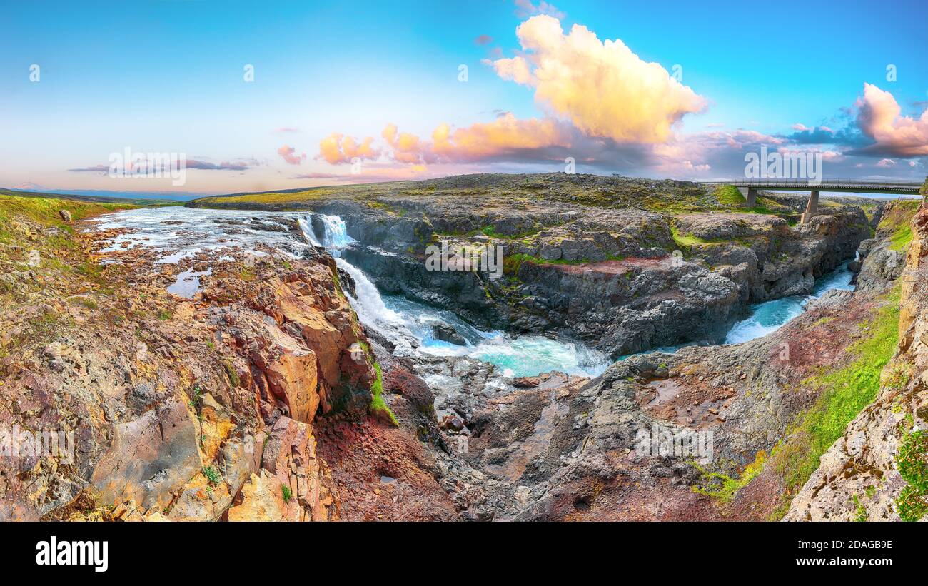 Breathtaking view of Kolufossar waterfall at sunset. Popular tourist ...