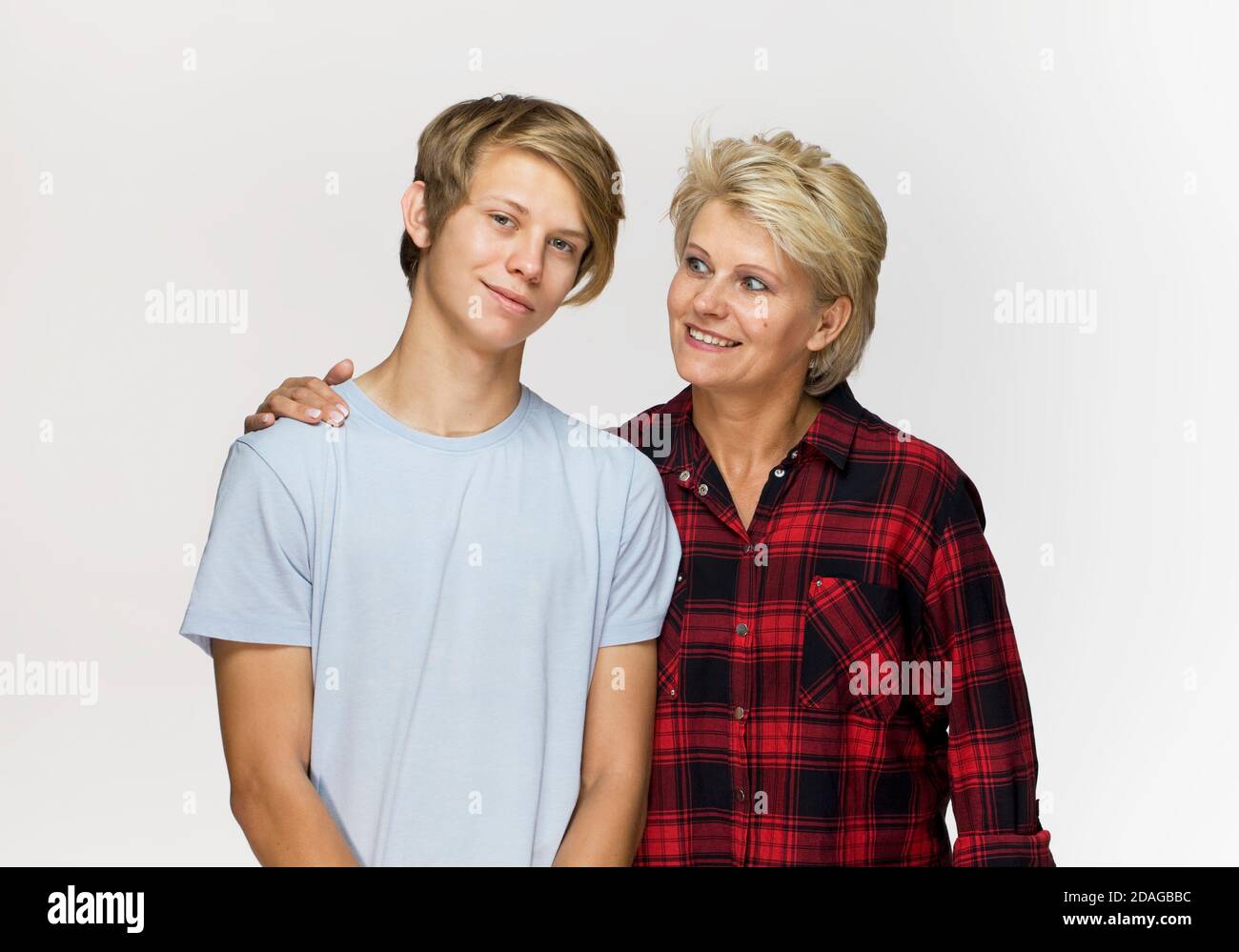 Happy family, mother and son smiling portrait against white background ...